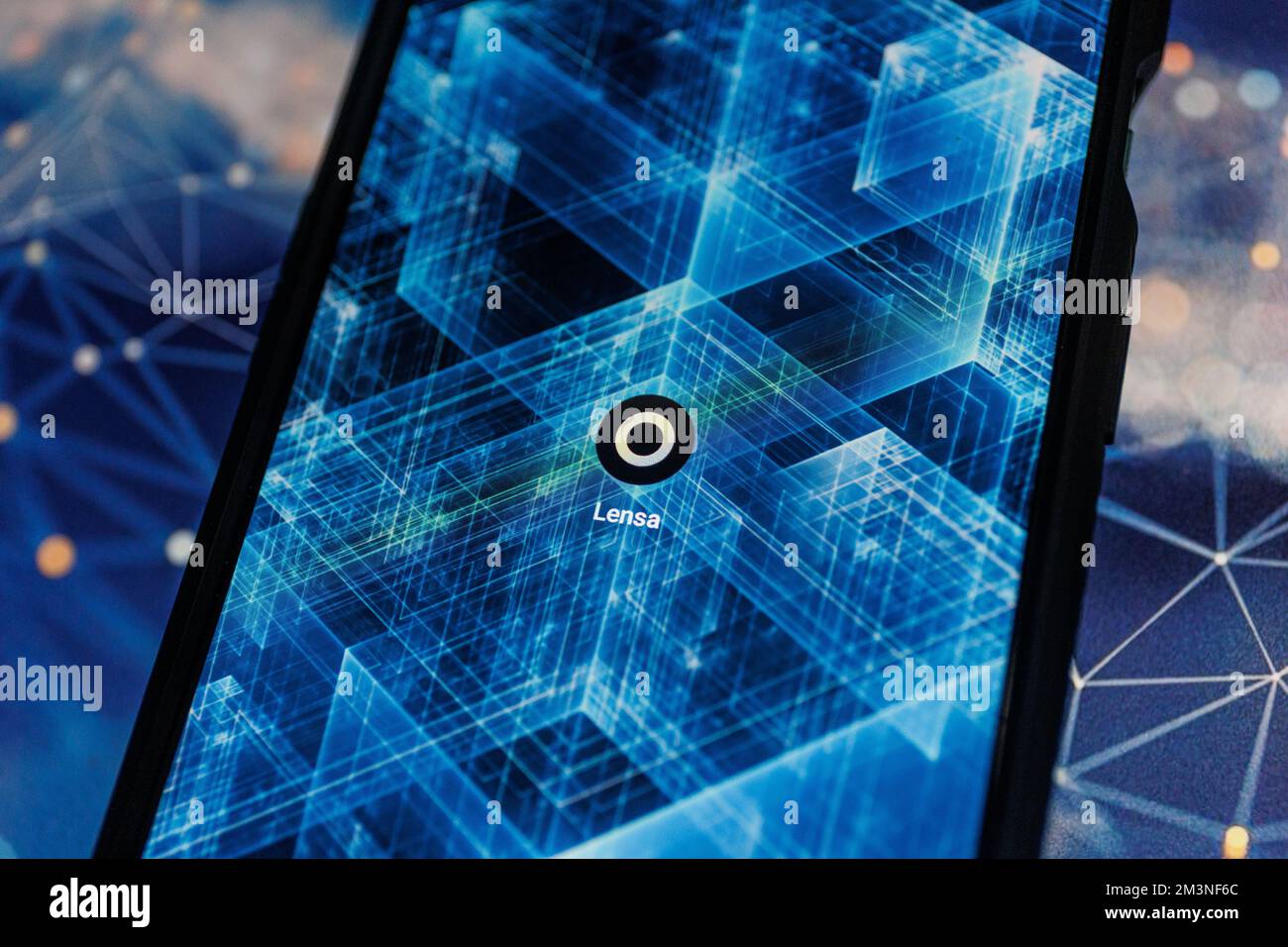 Lensa application on smartphone. Lensa app uses AI to make magic ...