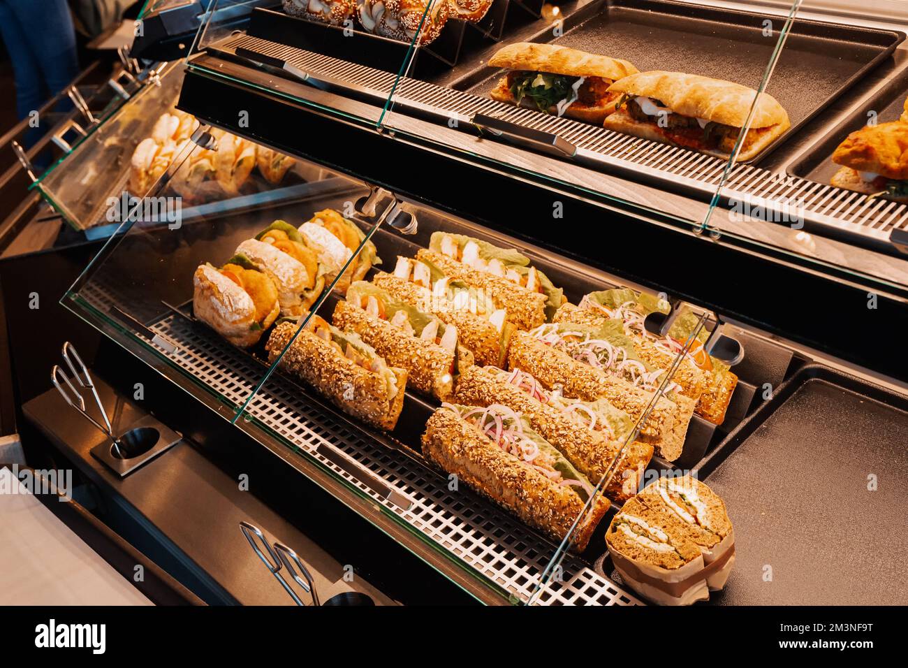 An assortment of sandwiches with various fillings are sold in the ...