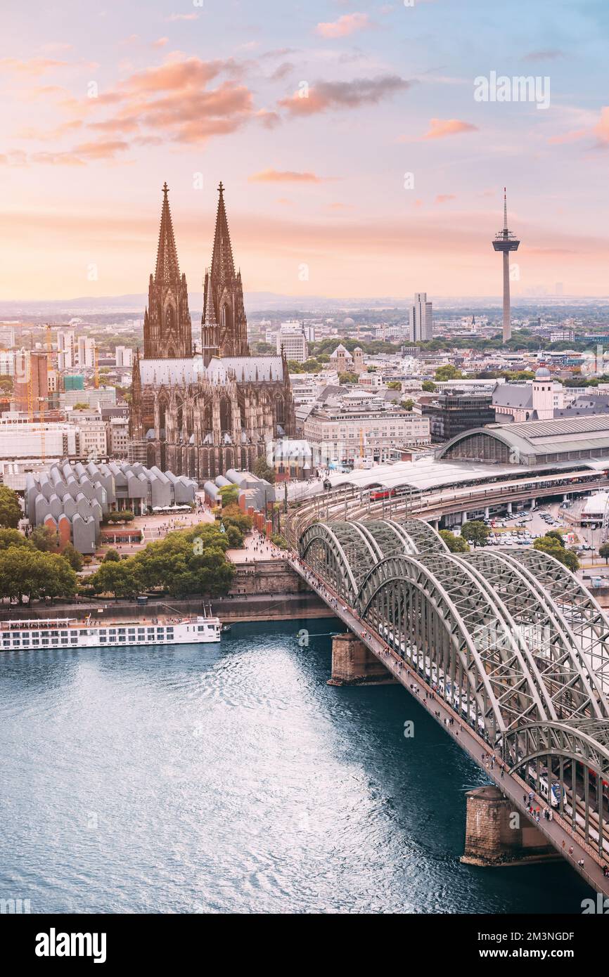 Cologne Aerial vertical view with trains move on a bridge over the ...