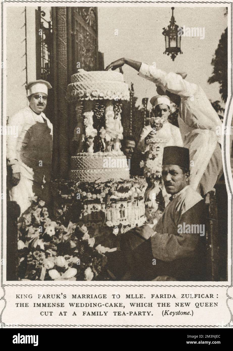 The immense wedding cake of King Faruk and Queen Farida of Egypt. Date: January 1938 Stock Photo ...