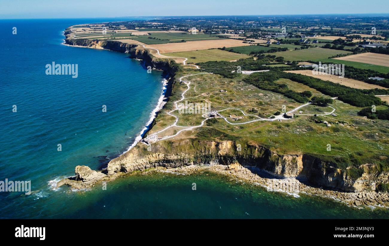 An aerial view of the Pointe du Hoc Historical Ranger Monument island ...