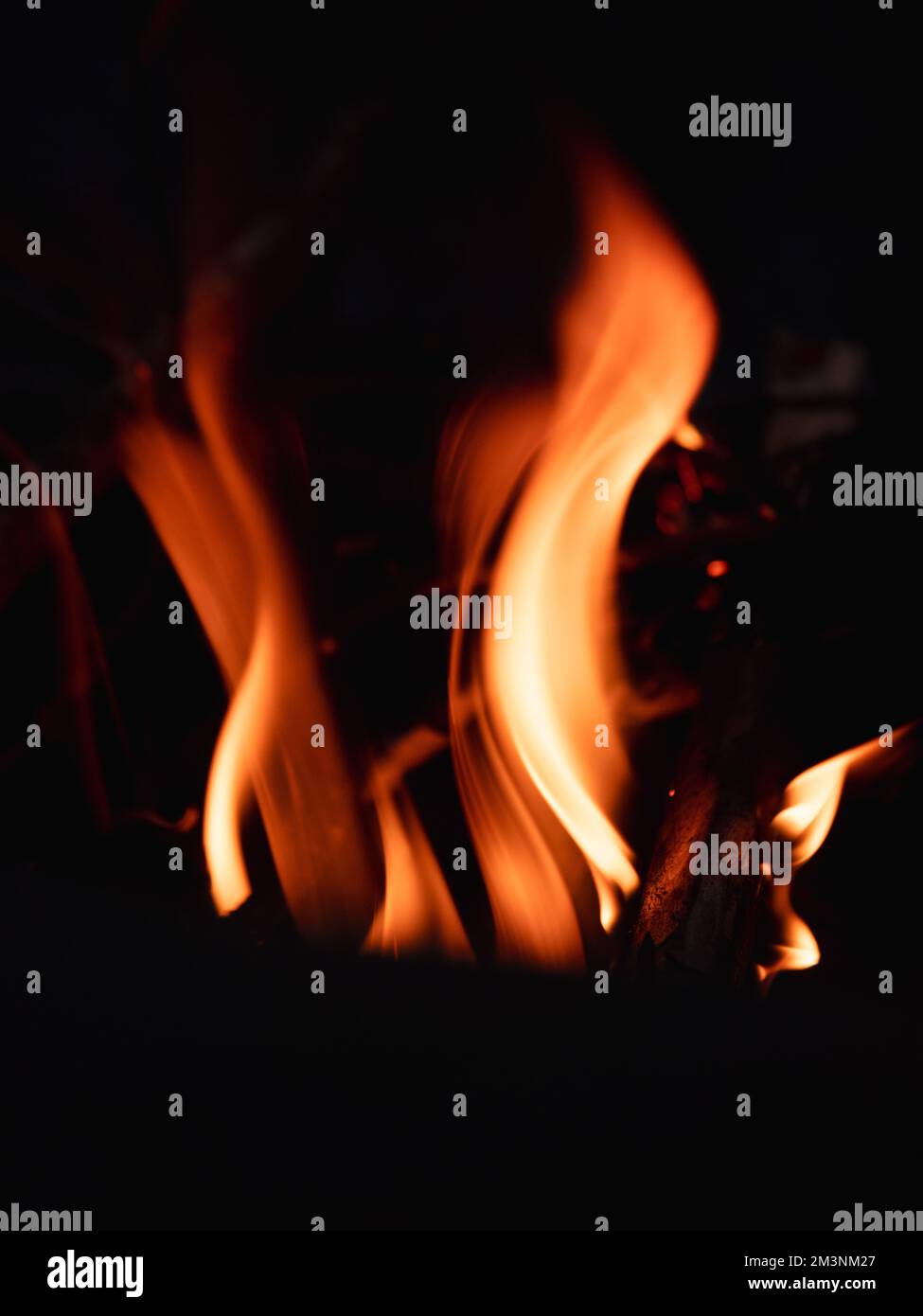 orange and yellow flames engulf the wood in the fire Stock Photo - Alamy