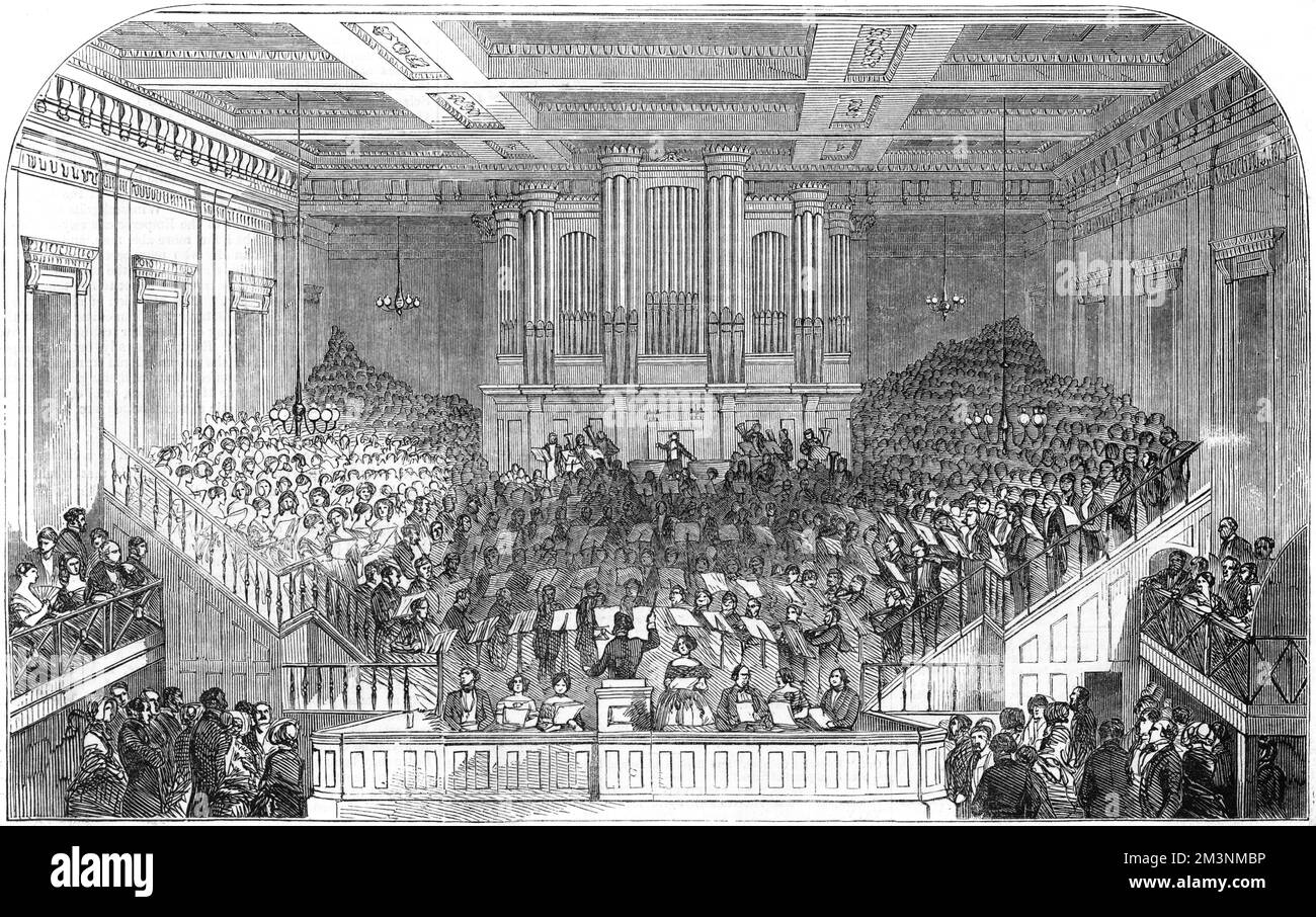 A concert at Exeter Hall, London, show casing the new orchestra. Date ...