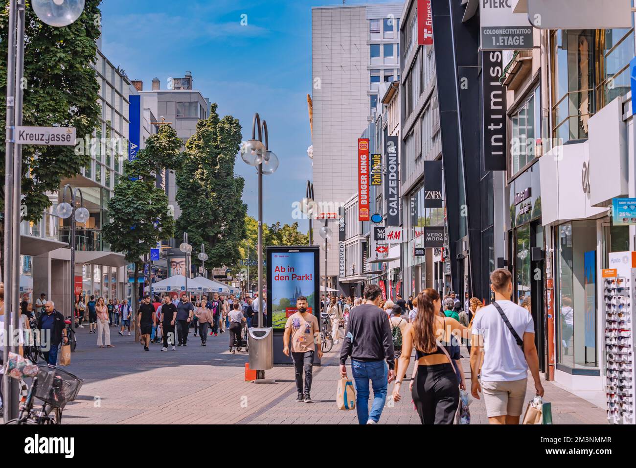 29 July 2022, Cologne, Germany: Panoramic view of city life. People and ...