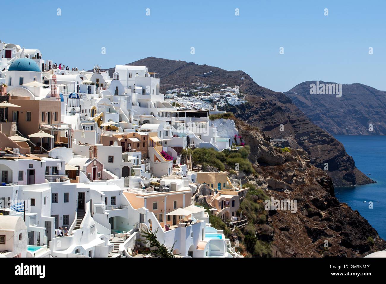 An aerial view of the coastal marble buildings of Oia village Stock ...