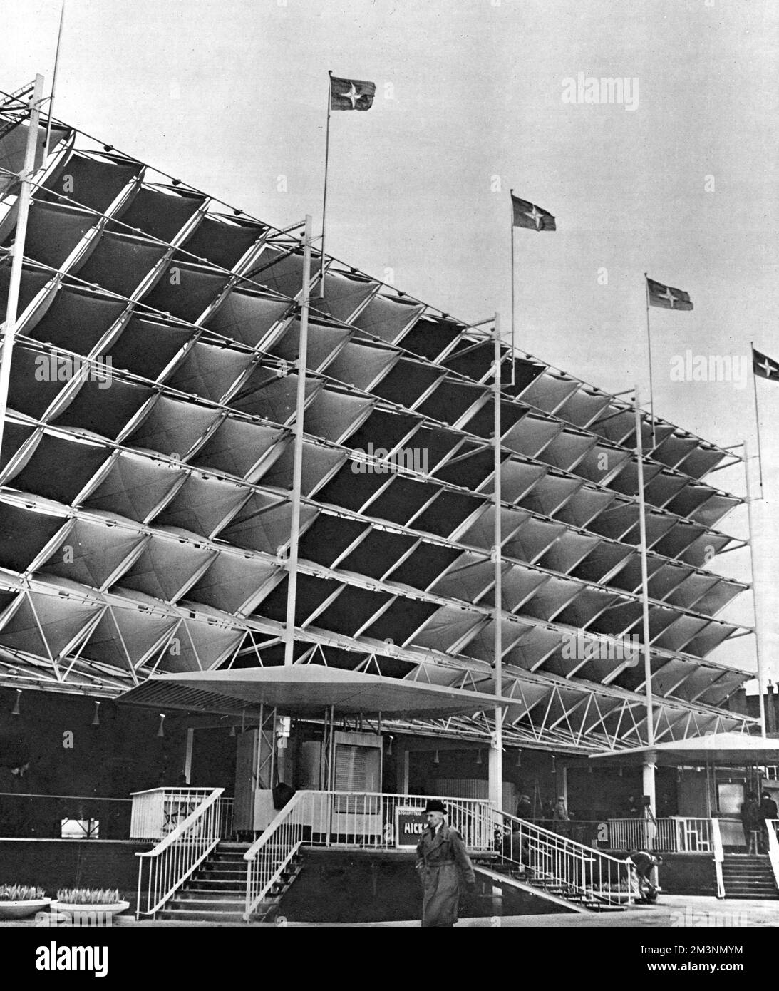 View of a brightly coloured canvas and tubular aluminium screen which ...