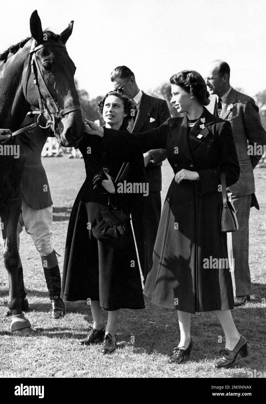 Patting his horse Black and White Stock Photos & Images - Alamy