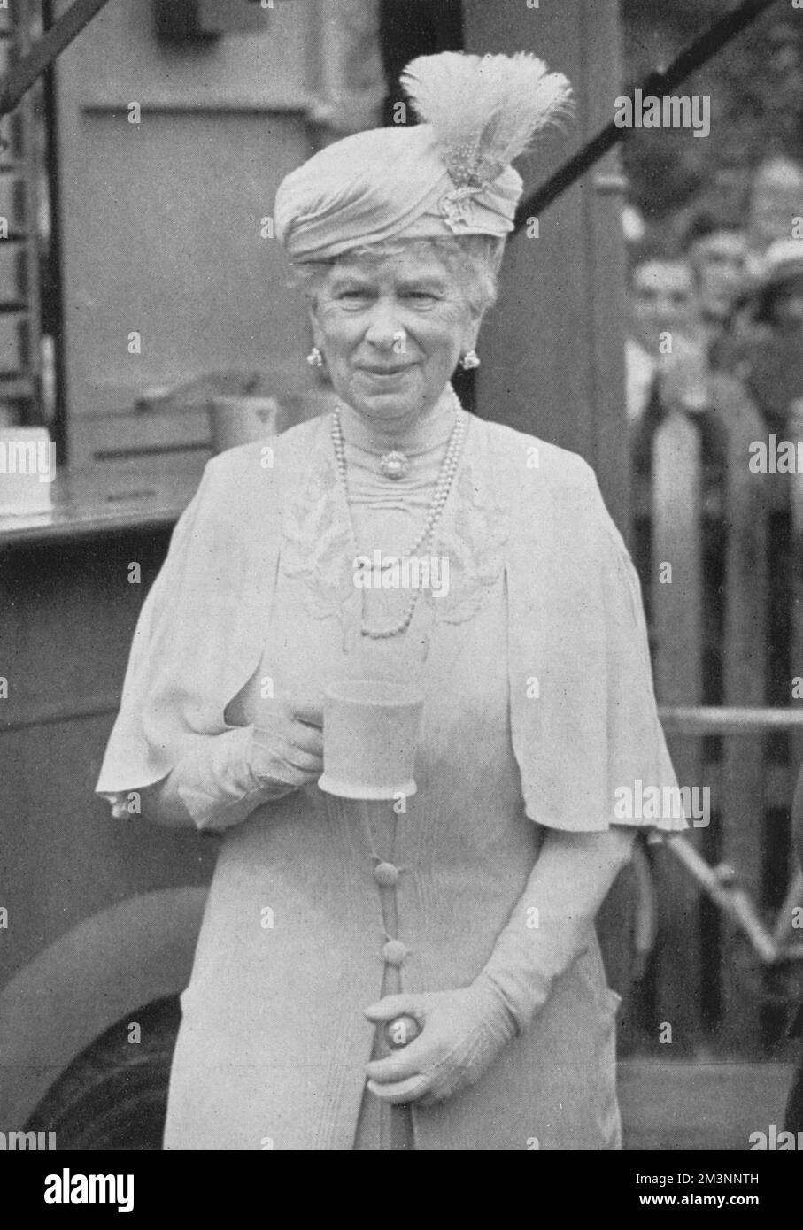 Queen Mary drinking tea Stock Photo - Alamy