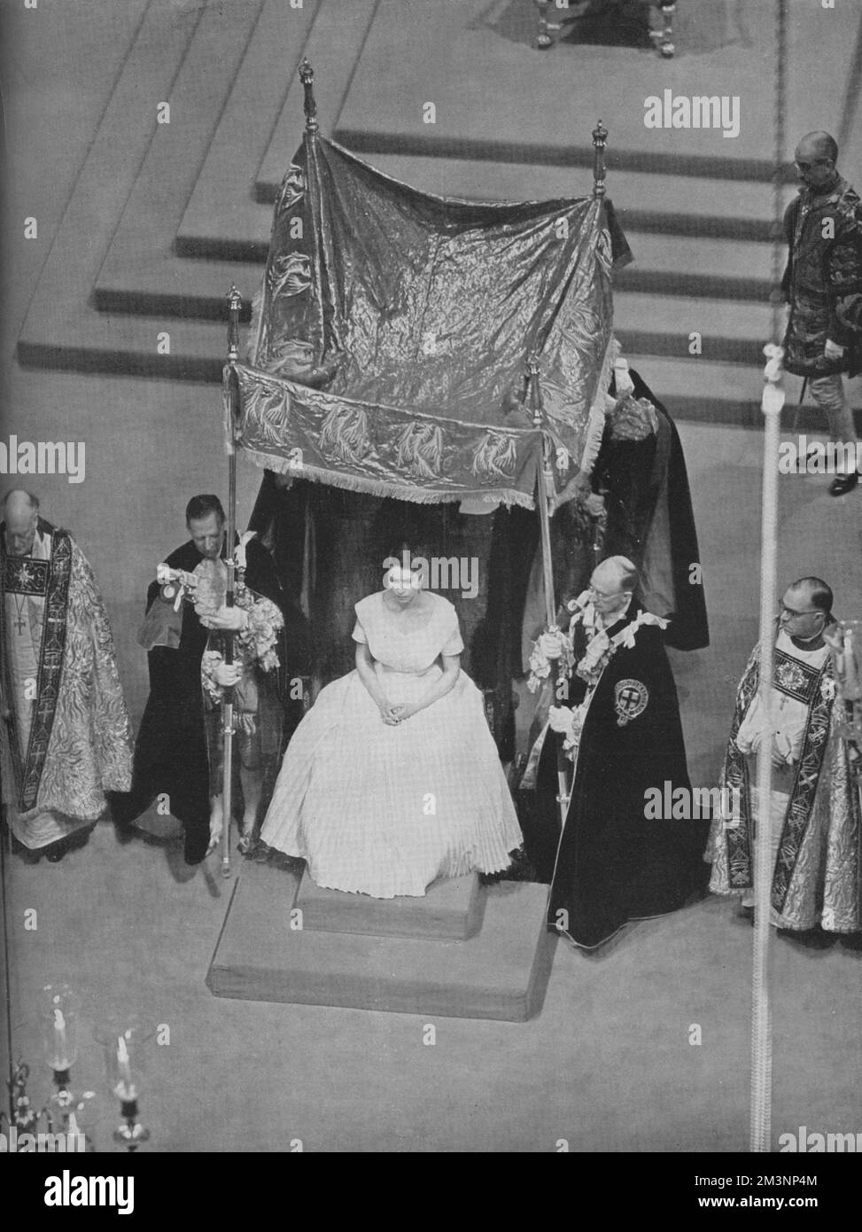 Queen Elizabeth II in the simple white gown in which she was anointed ...
