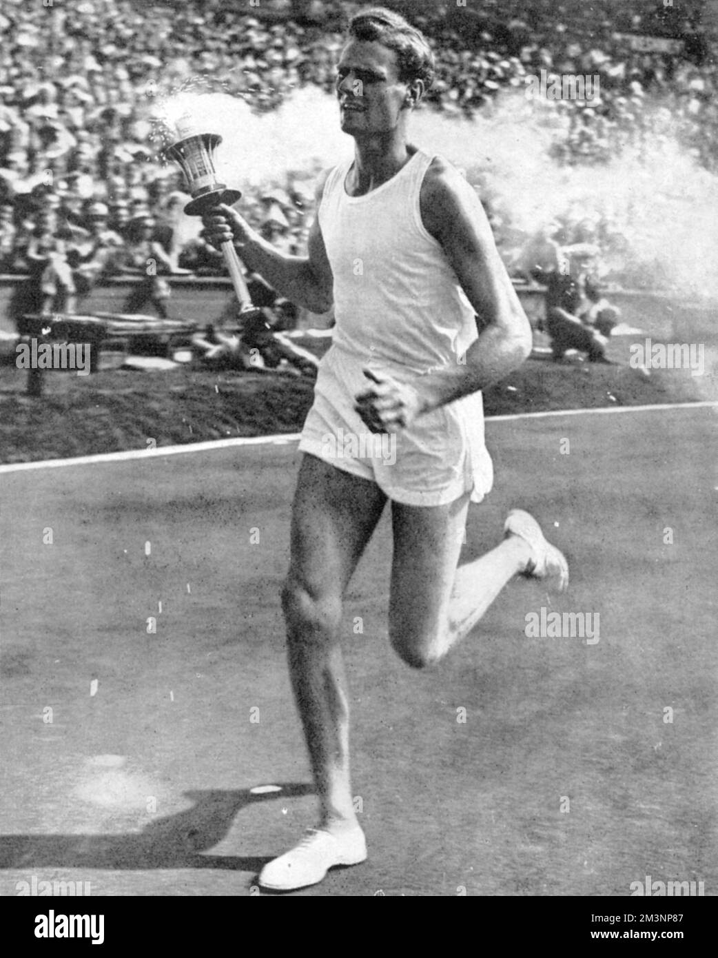 John Mark carrying the Olympic torch, opening ceremony, 1948 Stock ...