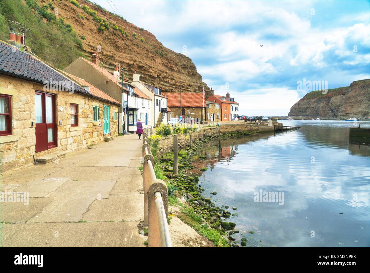 Looking east down Staithes Beck (river) towards sea at the quaint ...