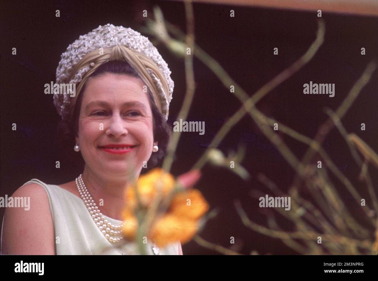 Queen Elizabeth II smiles while in Grenada during her tour of the West ...