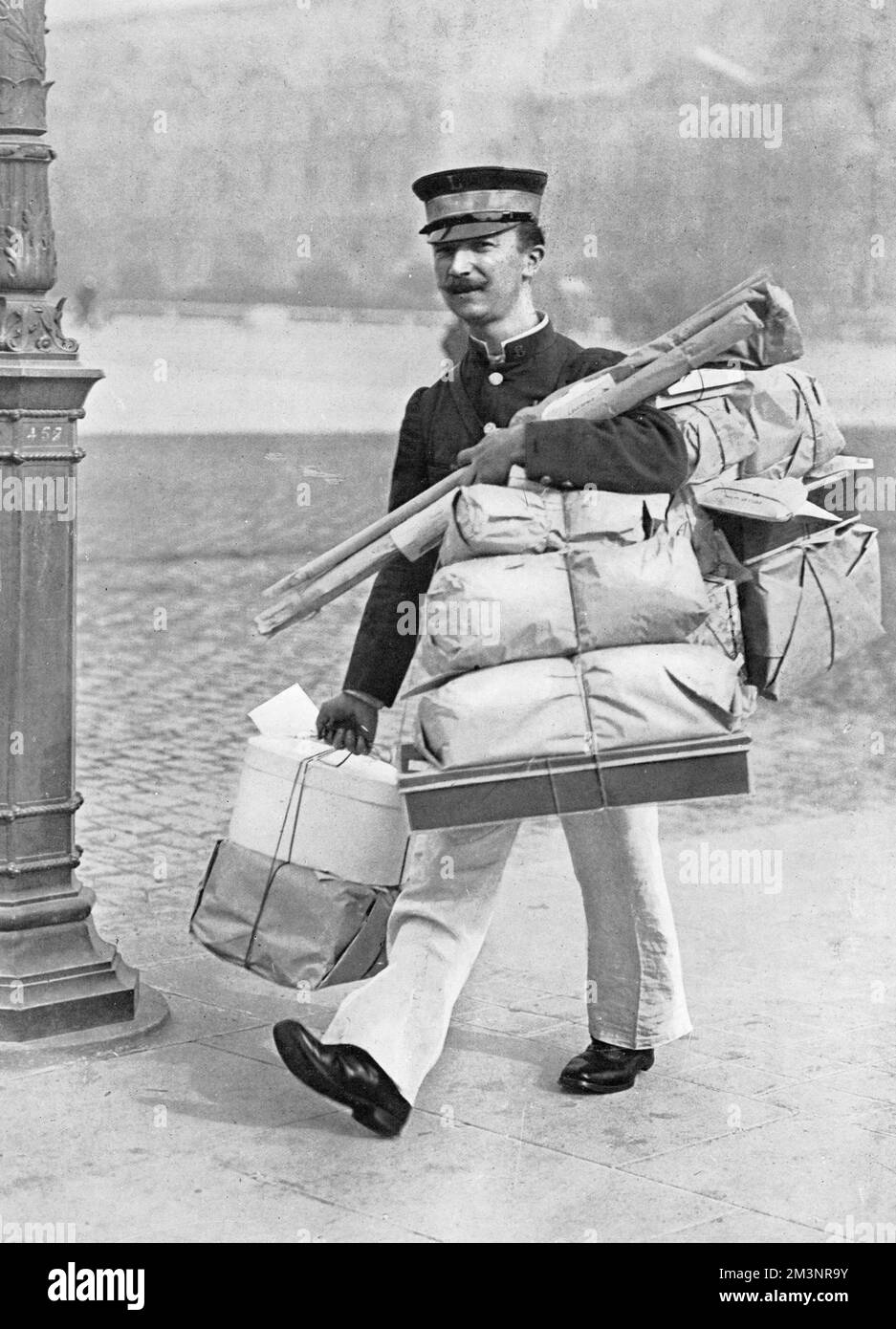 French parcel delivery man at Christmas, 1913 Stock Photo - Alamy