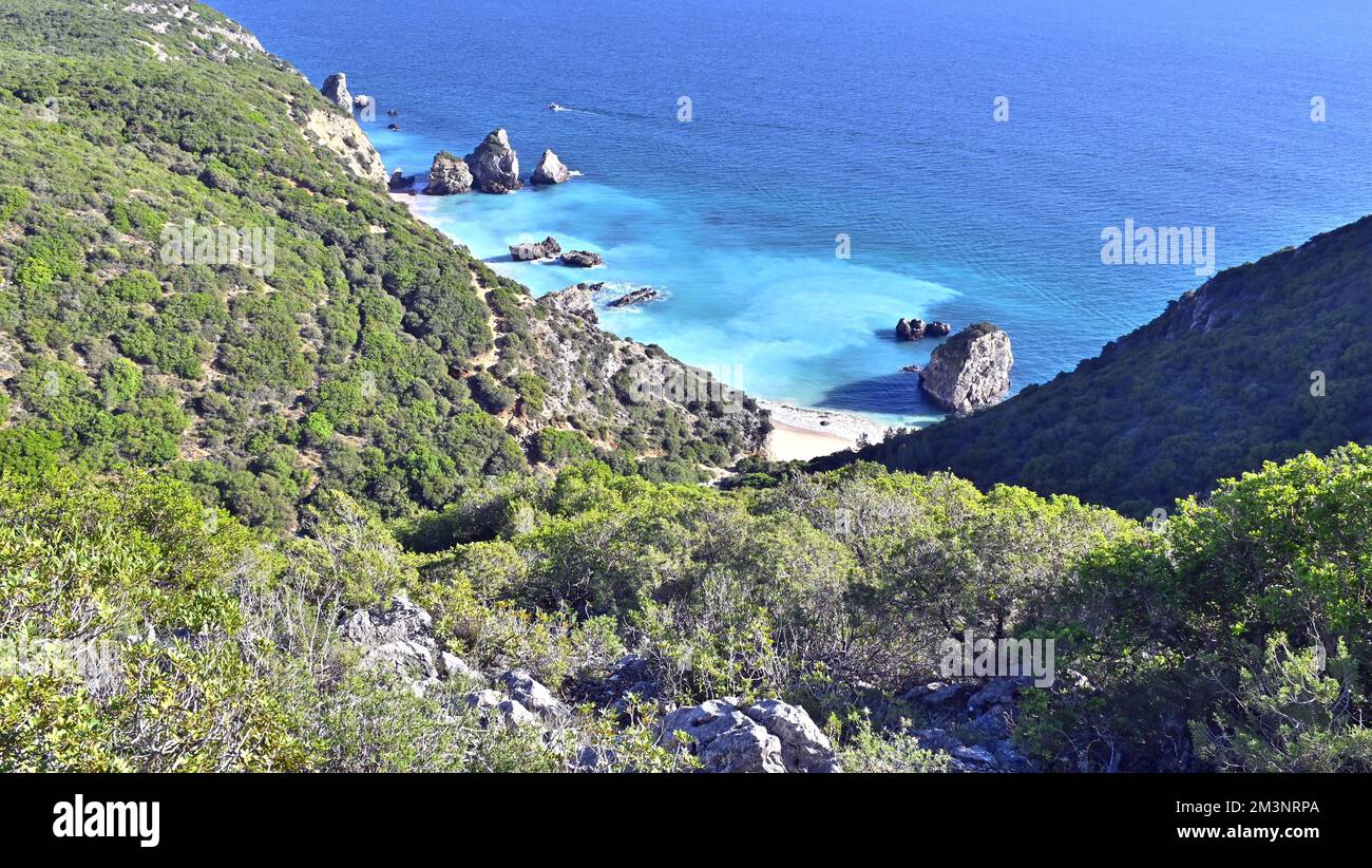 A beautiful view of Ribeiro do Cavalo Beach with rock formations in the ...