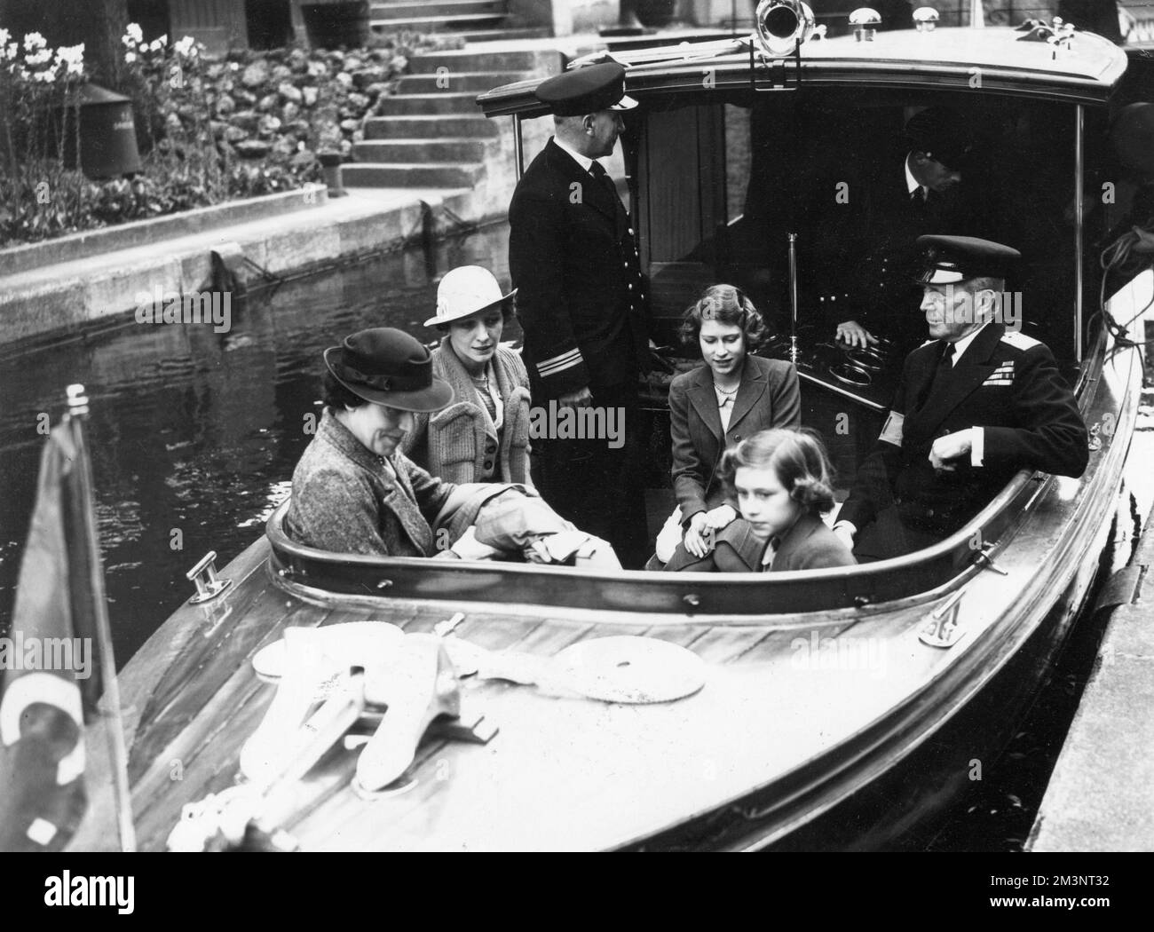 Royal sisters with governess Marion Crawford Stock Photo - Alamy