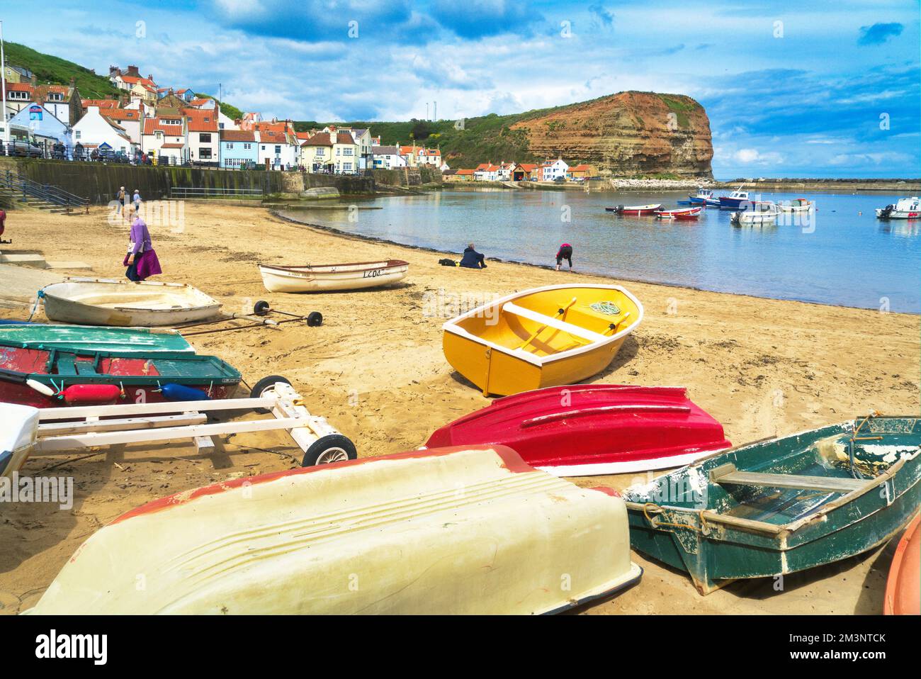 Staithes harbour, beach and cliffs from beach. North Yorkshire; England ...