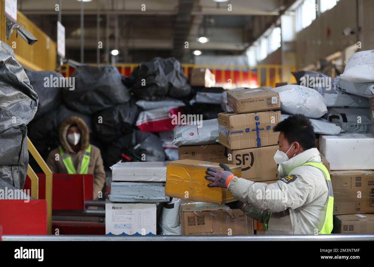 **CHINESE MAINLAND, HONG KONG, MACAU AND TAIWAN OUT** Staff are busy ...