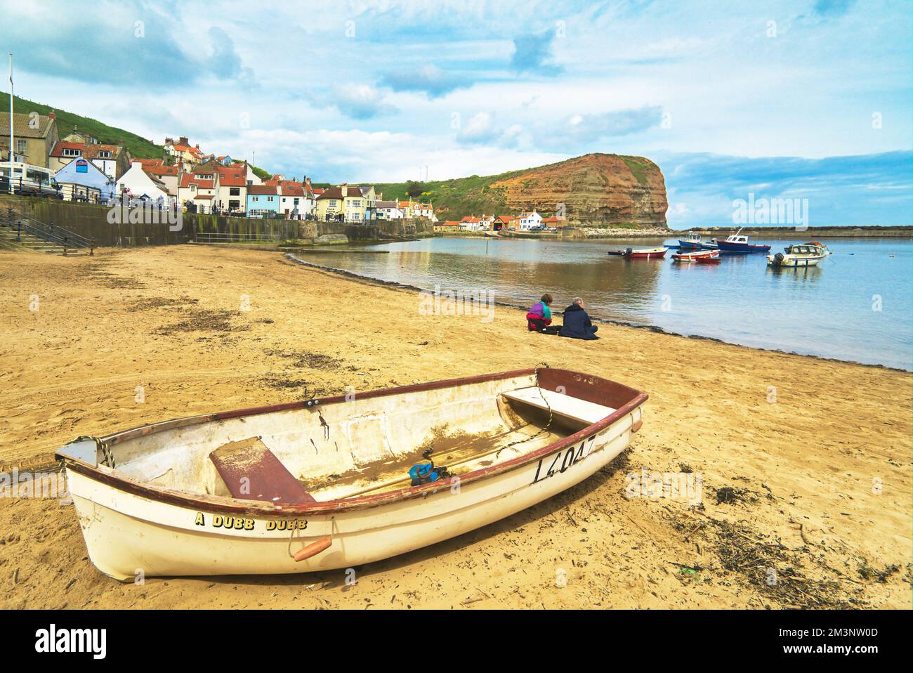 Staithes harbour, beach and cliffs from beach. North Yorkshire; England ...