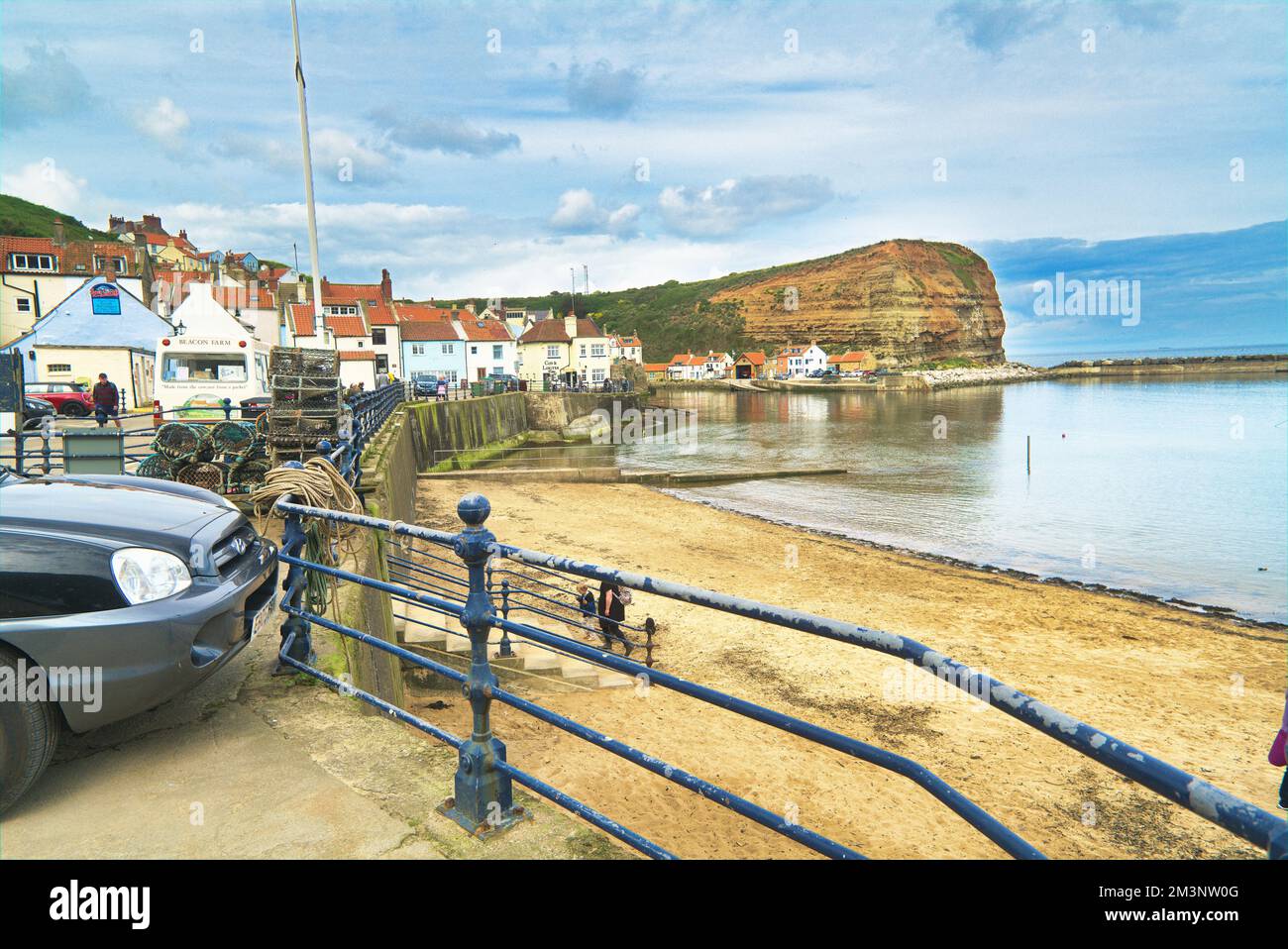Staithes harbour, beach and cliffs from beac. North Yorkshire; England ...
