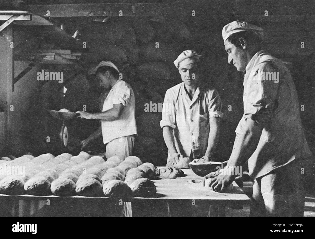 German prisoners in Britain, baking bread, 1946 Stock Photo - Alamy