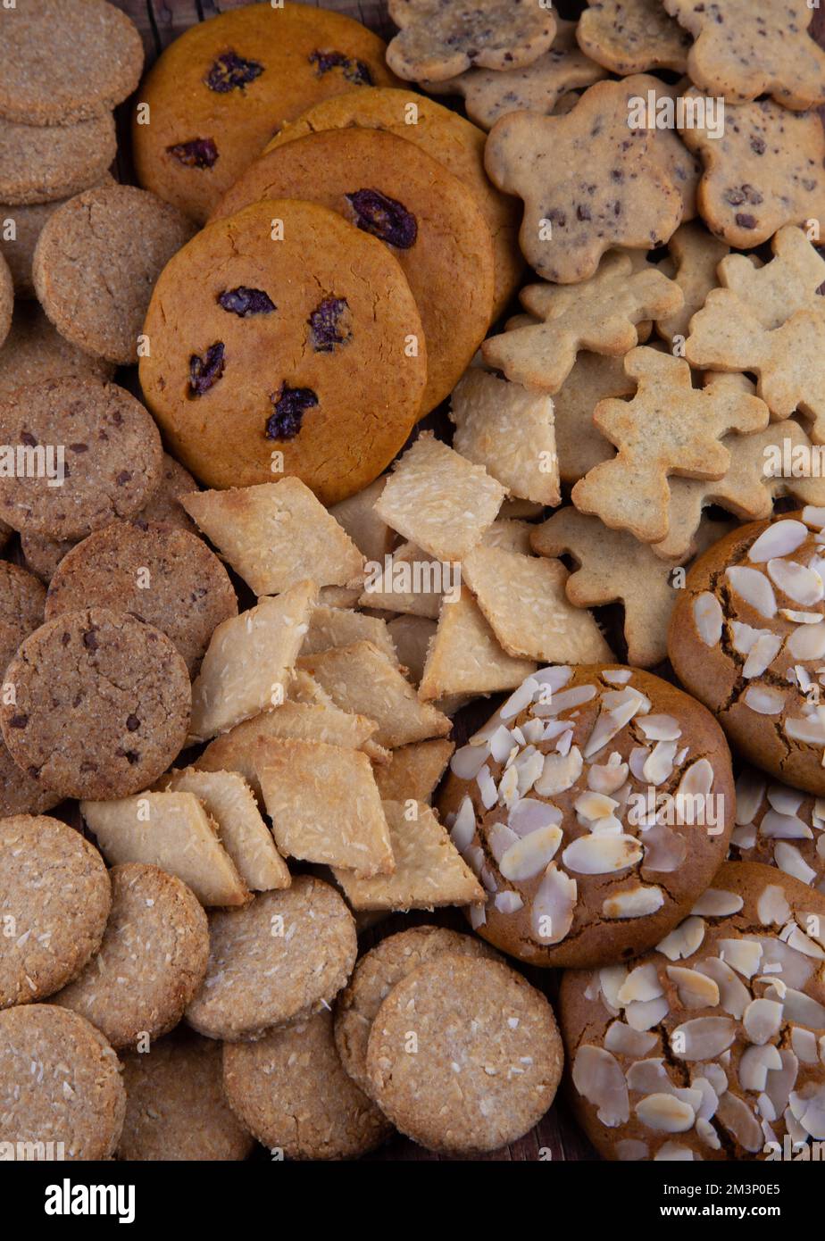 Cookies background. A set of different cookies. Cookies with almonds ...