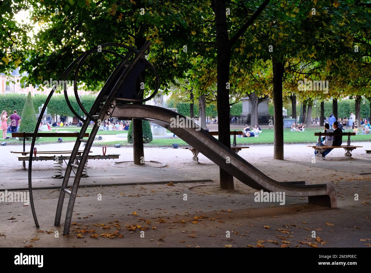The slide in a children's playground in the Place des Vosges in Paris ...