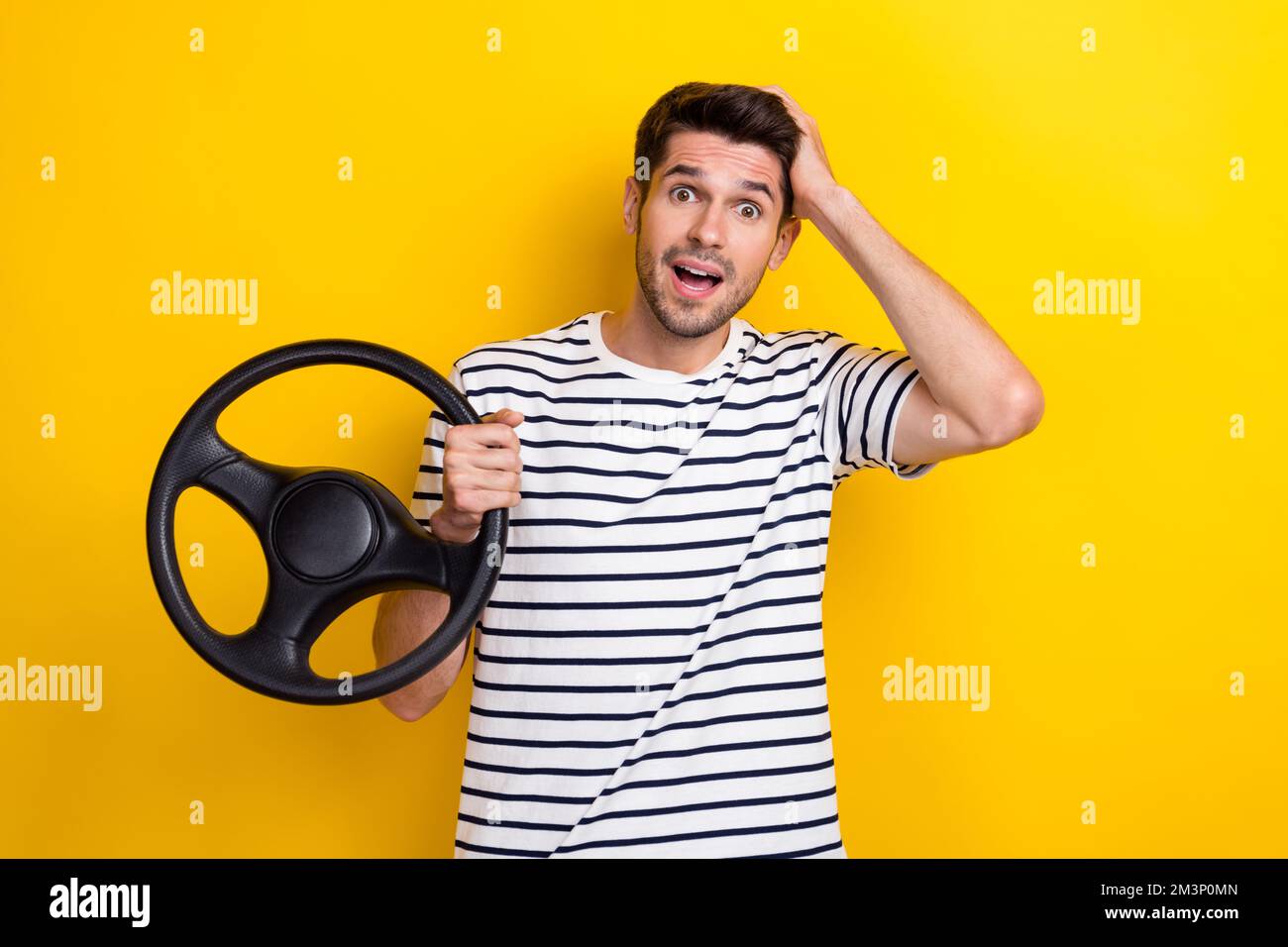 Photo of astonished person arm touch head hold wheel unbelievable ...