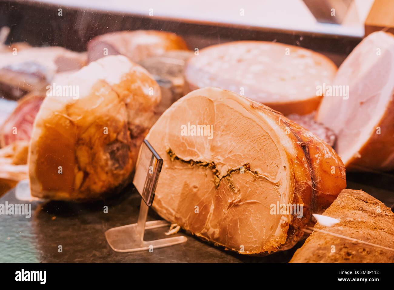 Delicious ham for sale at butchery shop Stock Photo - Alamy