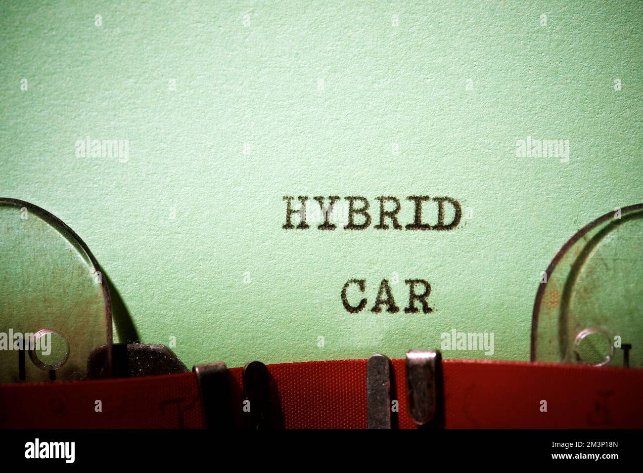 Hybrid car phrase written with a typewriter Stock Photo - Alamy