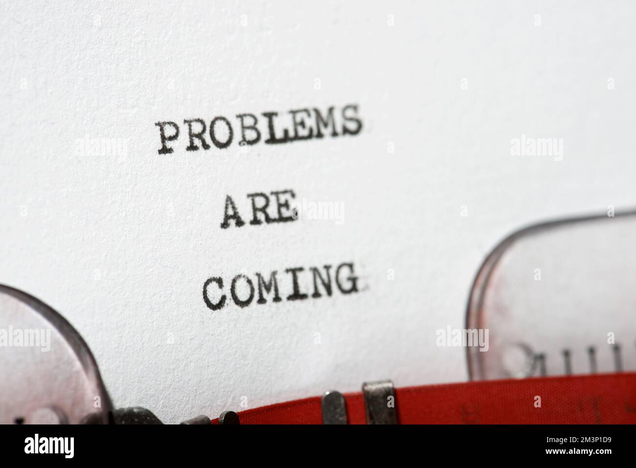 Problems are coming phrase written with a typewriter Stock Photo - Alamy