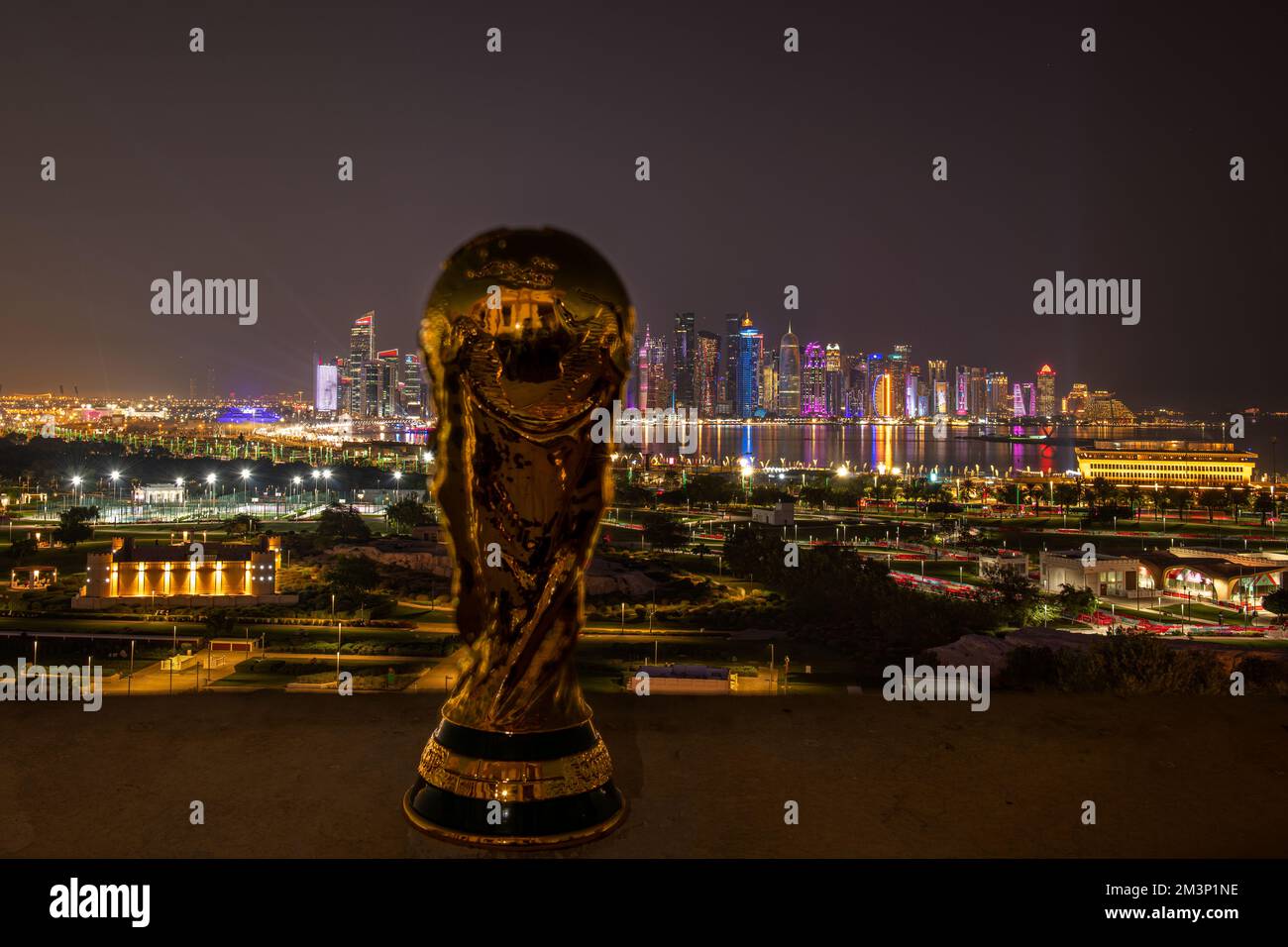 FIFA World cup Qatar 2022 Replica Trophy with Doha Skyline Stock Photo ...