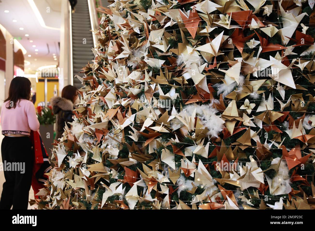 A giant Christmas tree decorated with tens of thousands of paper cranes ...