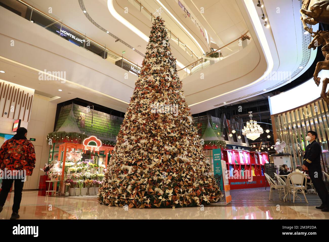 A giant Christmas tree decorated with tens of thousands of paper cranes ...