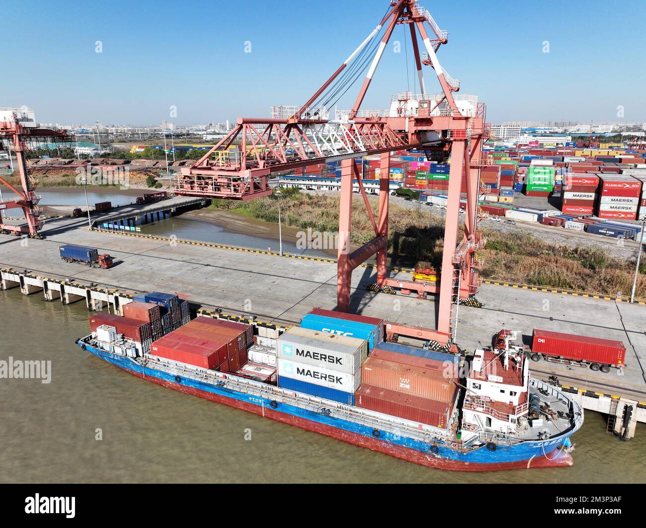 Aerial photo shows the busy scene at the container terminal in Yangzhou ...