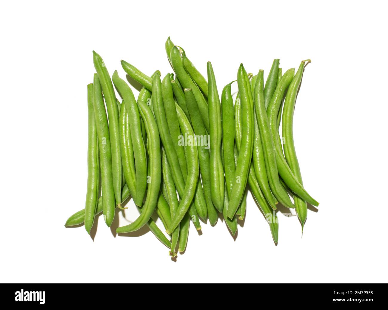 Green string beans on a white isolated background Stock Photo - Alamy