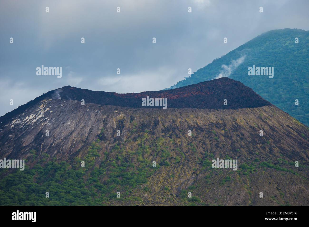 Clouds forming above volcano in the south Pacific Ocean - Ring of fire ...