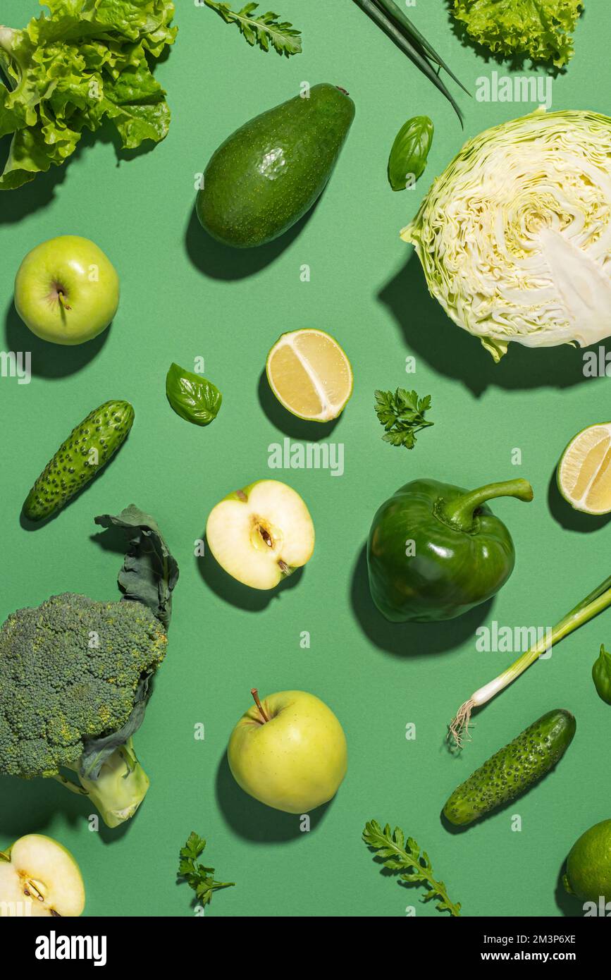 Green culinary background with fresh green vegetables and herbs ...