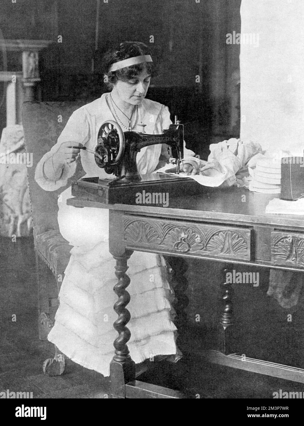 Lady Gladstone sewing clothes for wounded soldiers, WW1 Stock Photo - Alamy