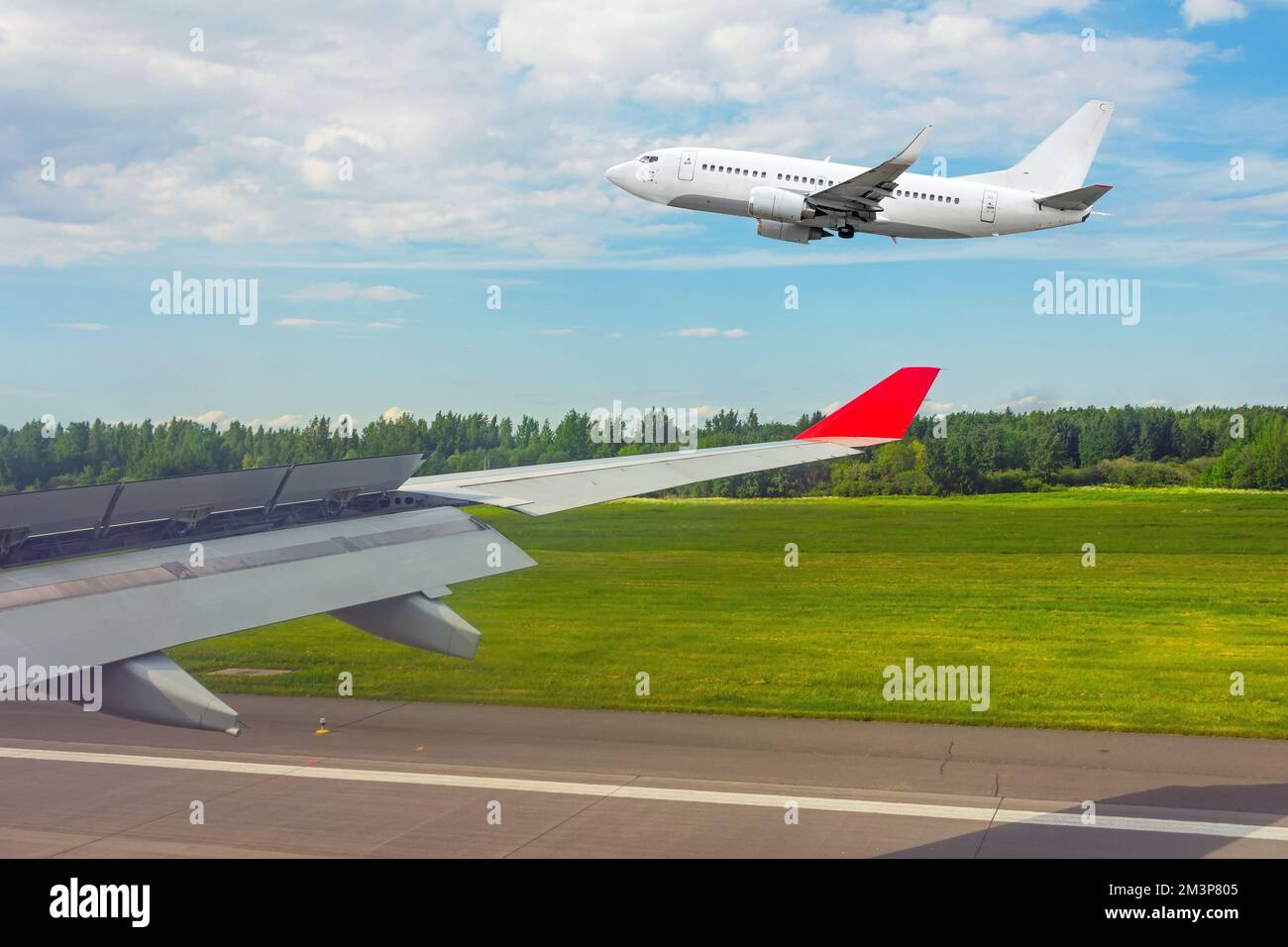 View from the window of the aircraft after landing on the runway and a ...