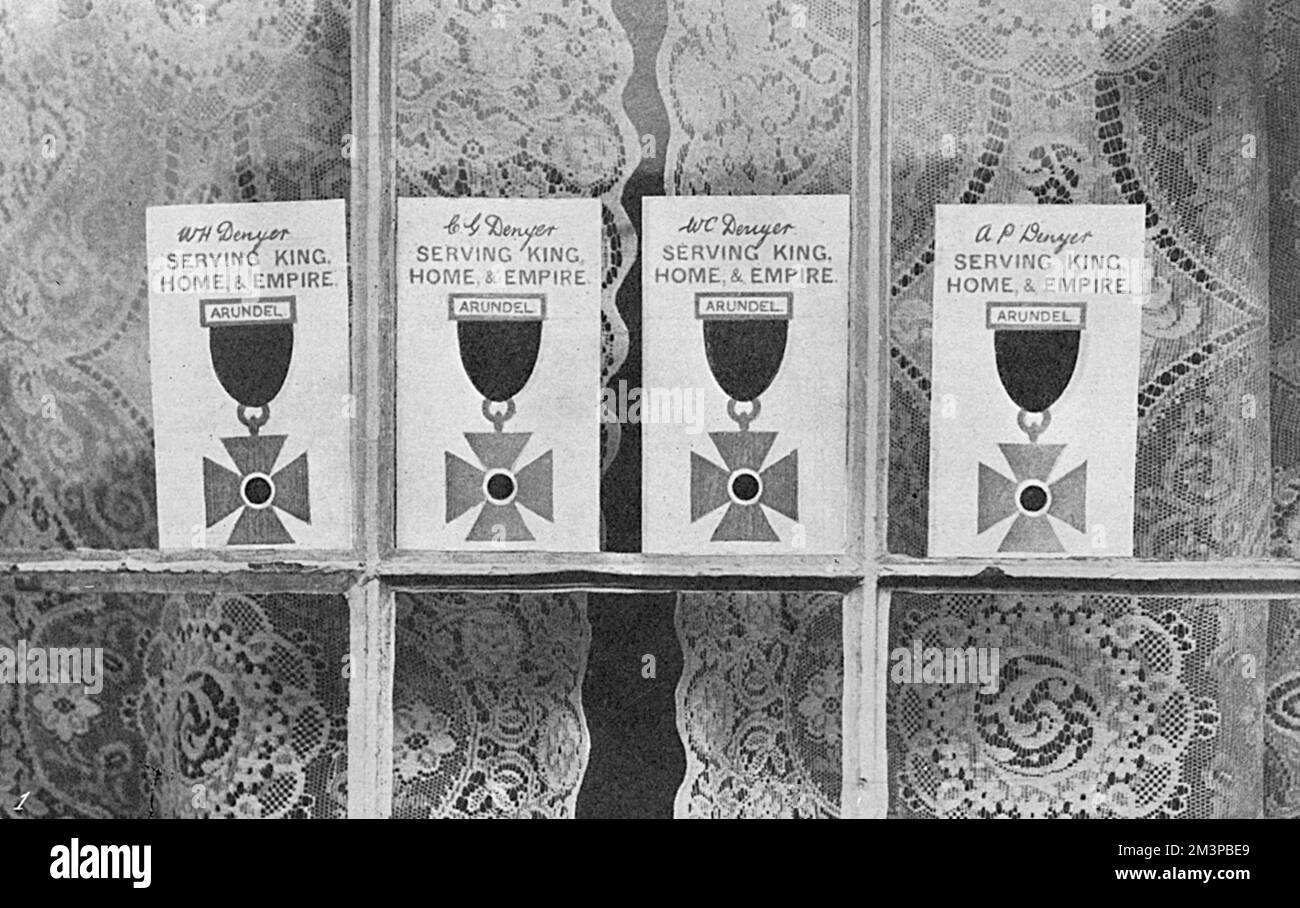 Service cards in a window in Arundel, WW1 Stock Photo - Alamy