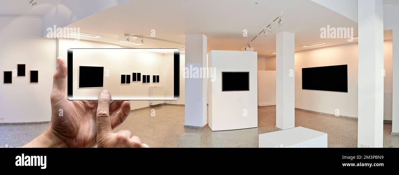 Male hand shoot with smartphone in a exhibition gallery, wall mounted ...