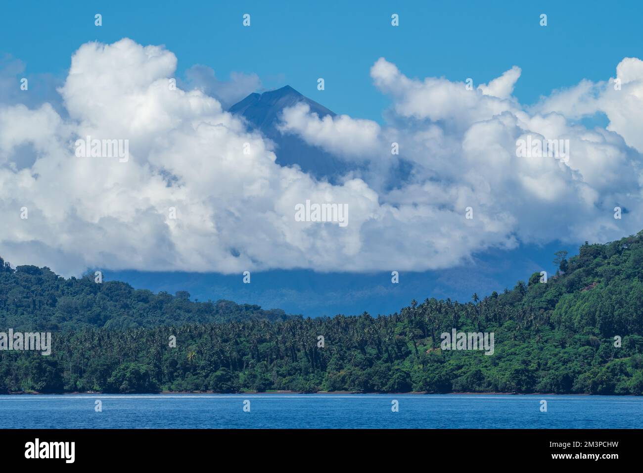 Clouds forming above volcano in the south Pacific Ocean - Ring of fire ...