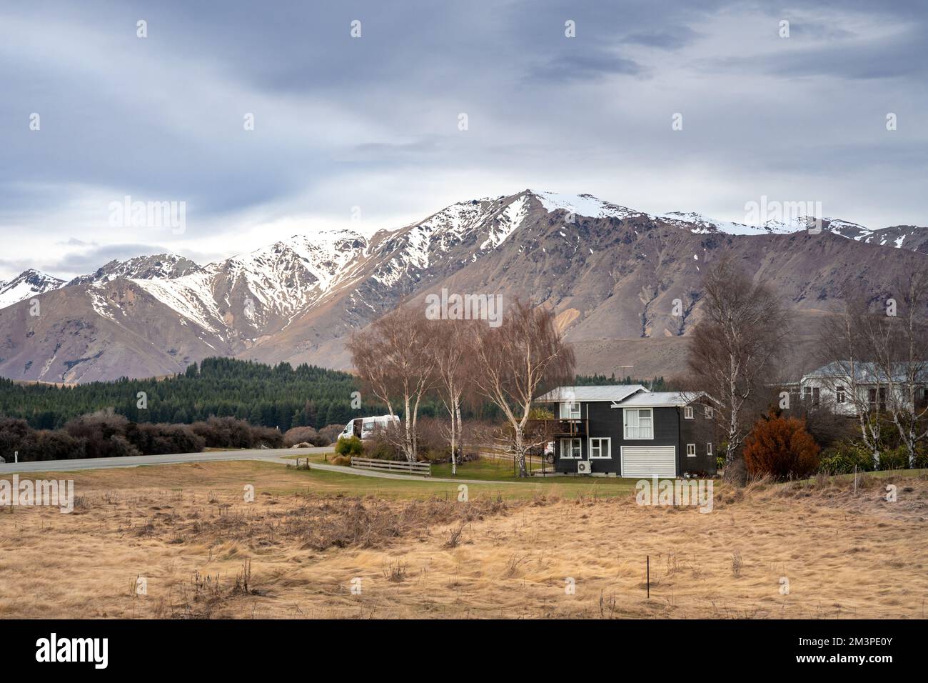 Sunrise view of the housing estate at Lake Tekapo in late winter with ...