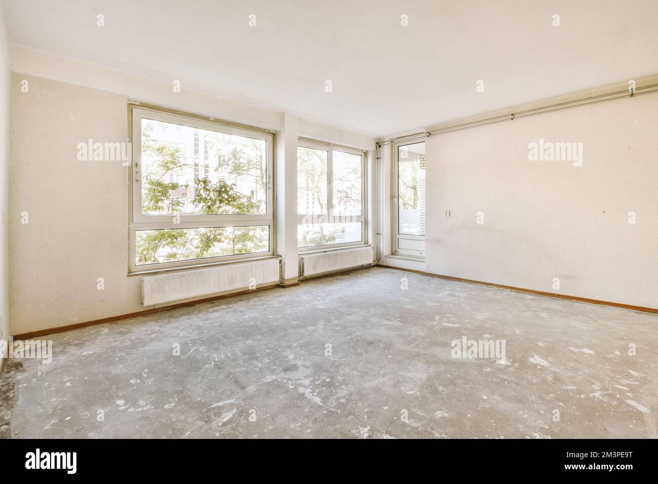 an empty room with no furniture or objects on the floor and windows ...