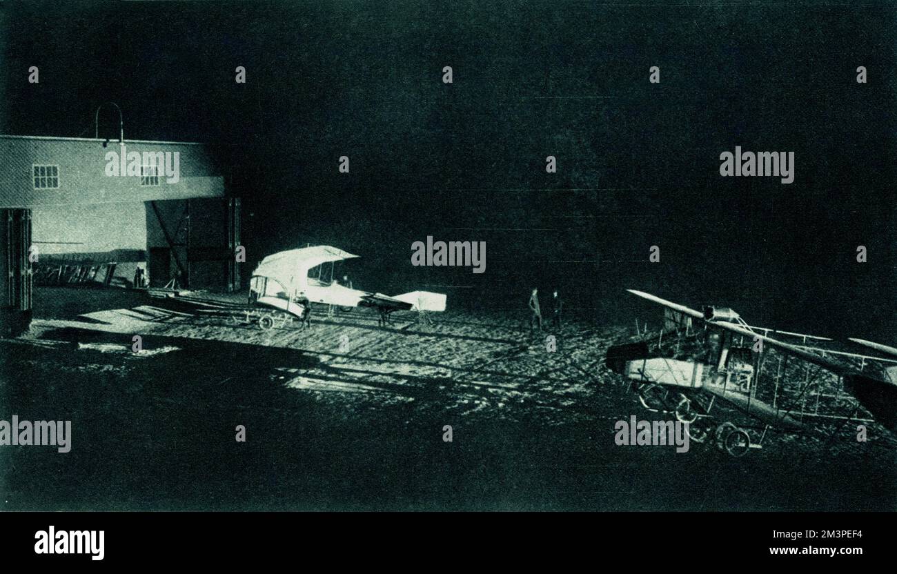 WW1 - German airfield lit up by searchlights Stock Photo - Alamy
