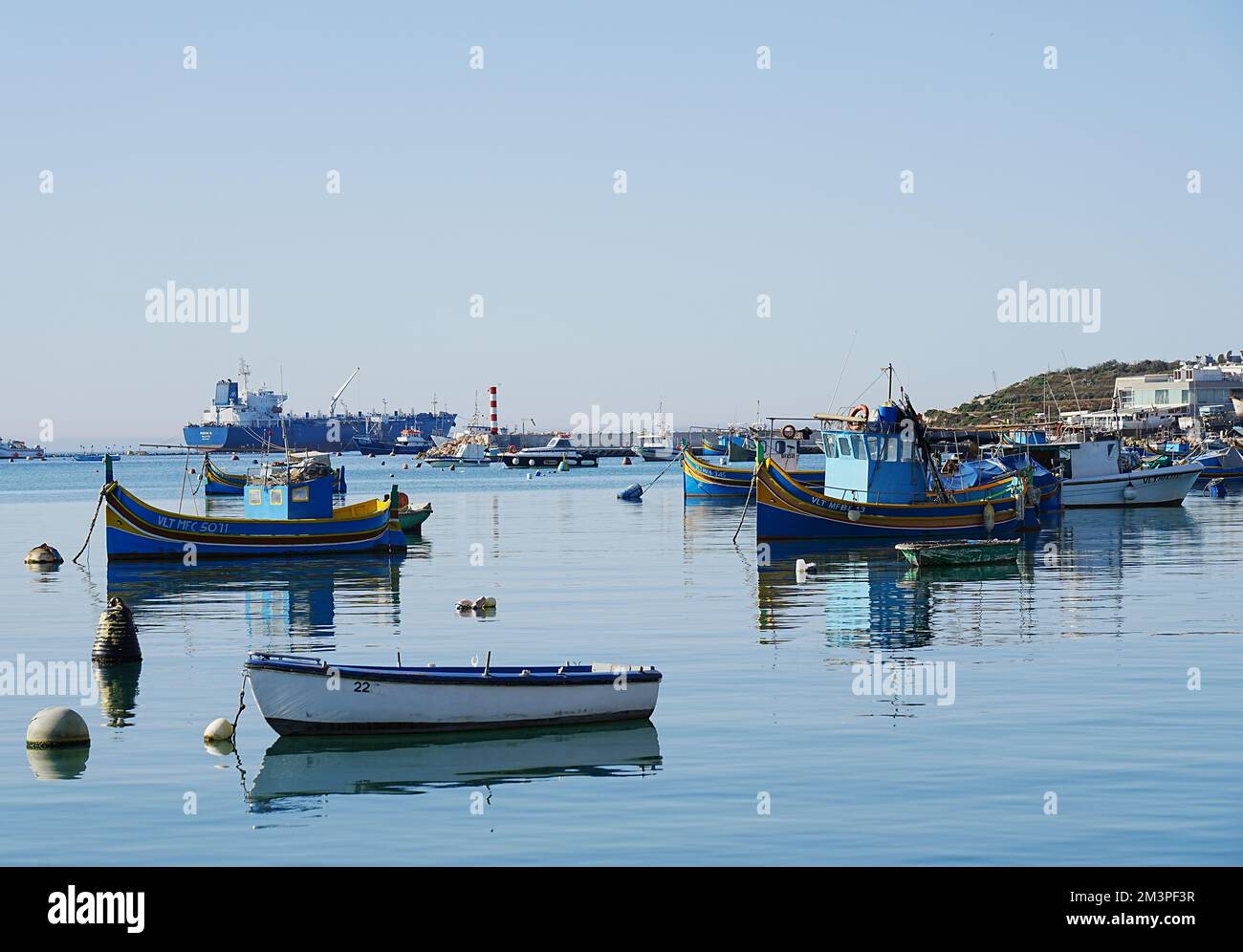 MARSAXLOKK, MALTA on May 2022: Port of european village, clear blue sky ...