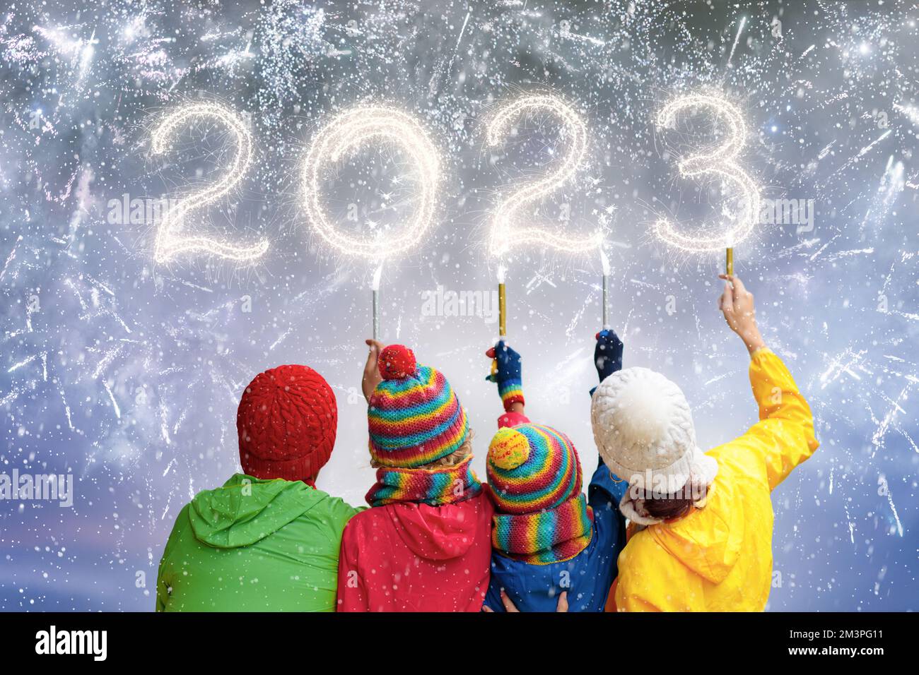 Happy new year. Family watching fireworks. Parents and kids celebrate ...