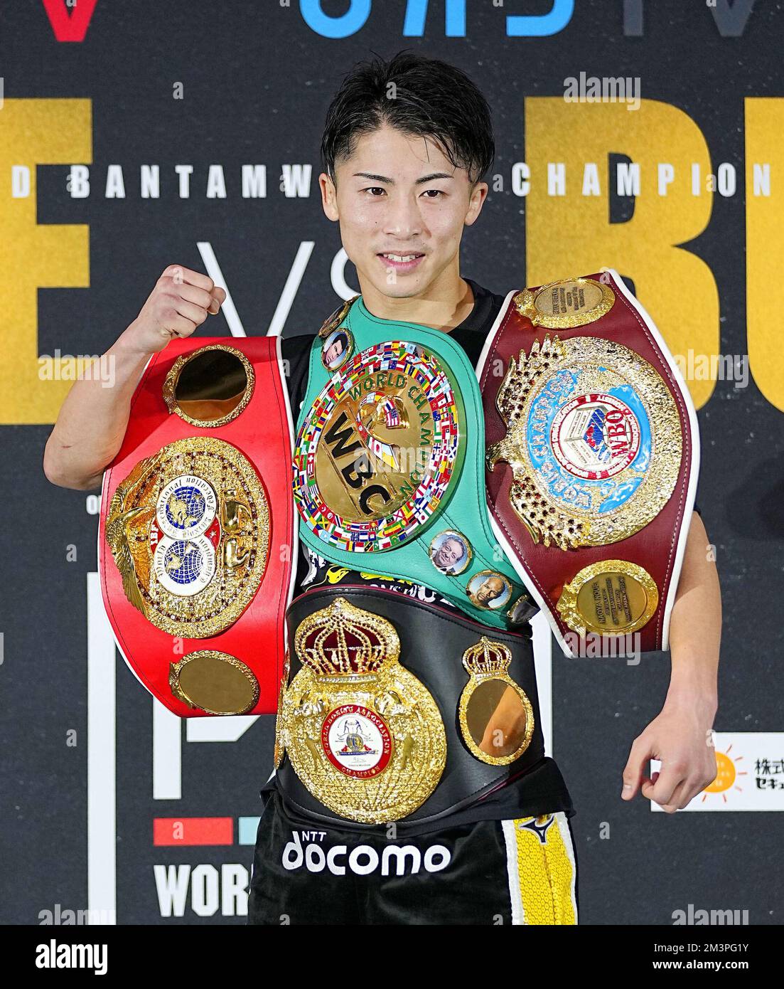Japan's Naoya Inoue poses with his four champion belts after defeating ...
