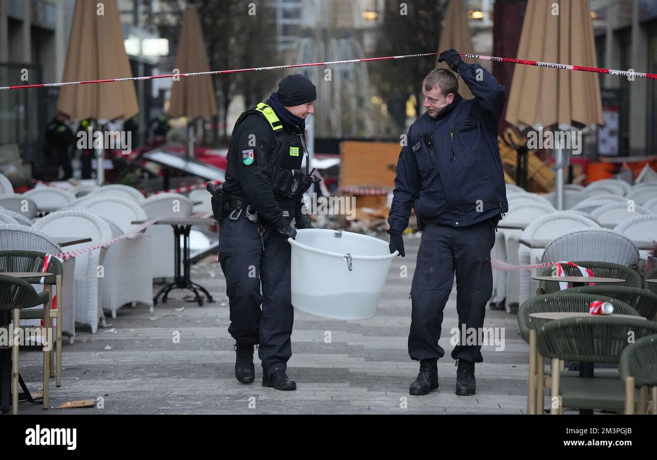 Berlin, Germany. 16th Dec, 2022. Two police officers bring fish in ...