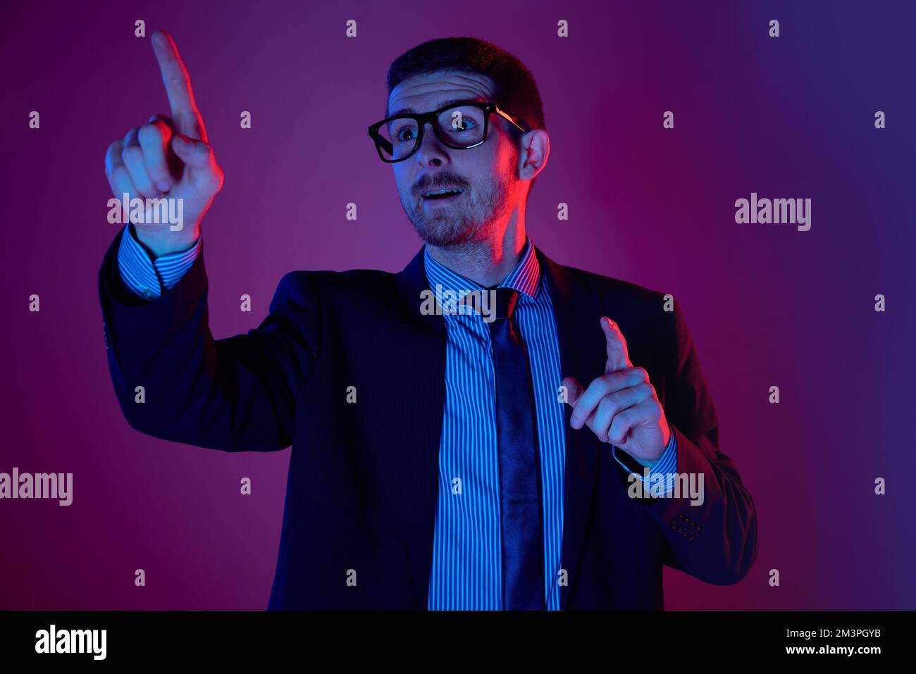 New idea. Portrait of young caucasian businessman in business suit and ...